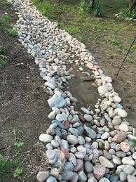 Transform Your Yard with a DIY Rock Drainage System – New and Tips